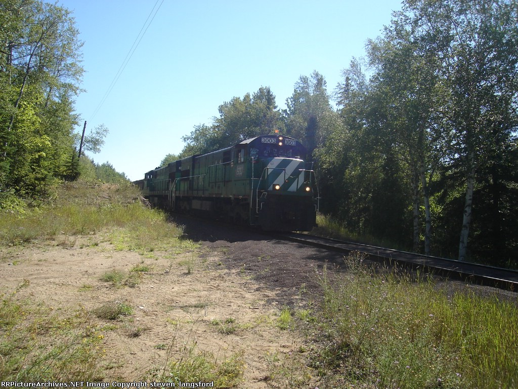 A loaded Ore Train aproaches The Bridge